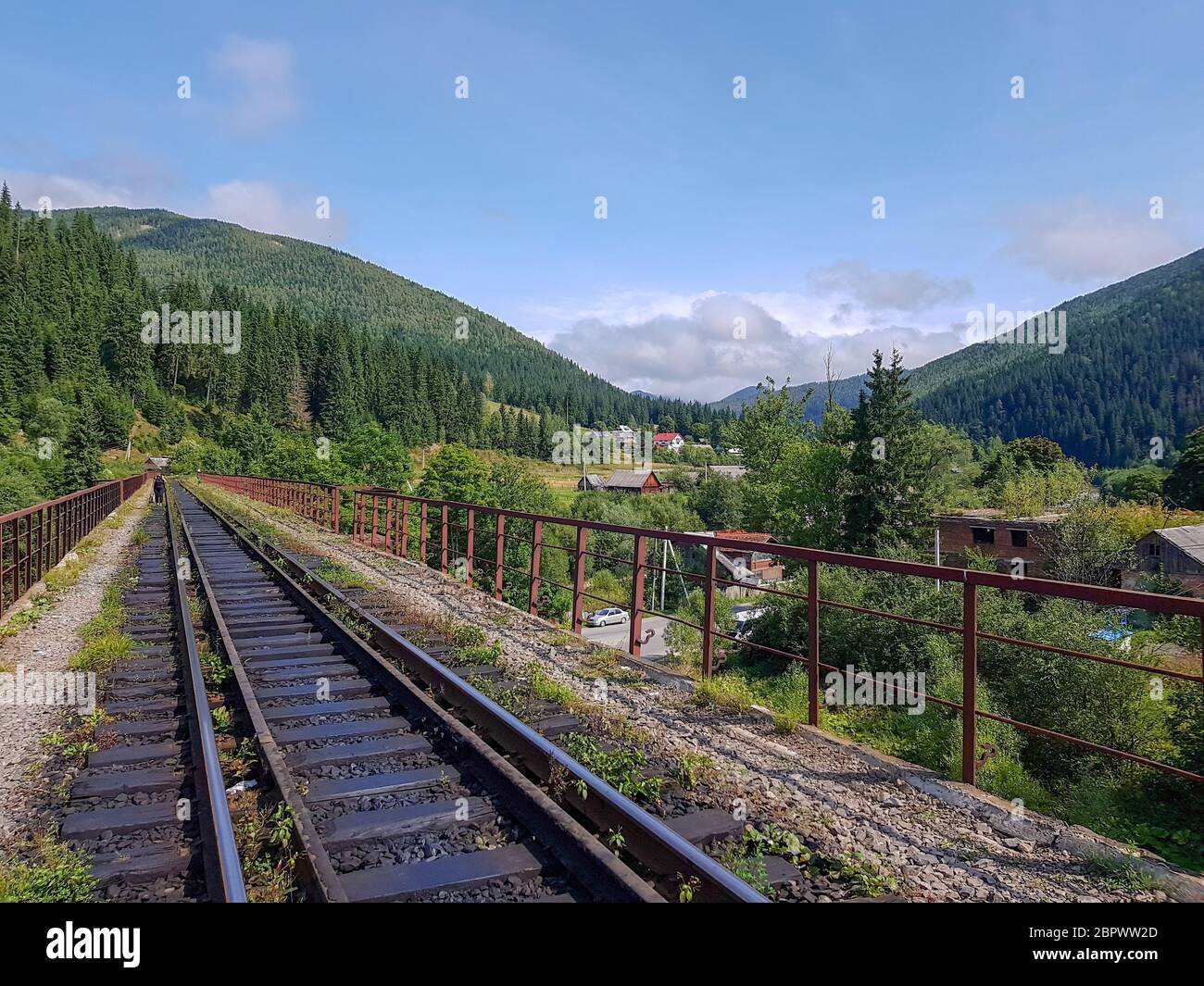Railway train passing mountains hi-res stock photography and images - Alamy