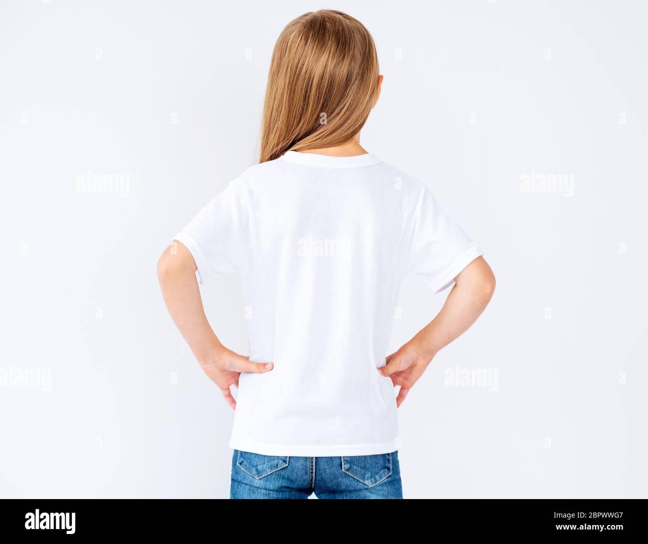 Back view of little girl in blank t-shirt Stock Photo - Alamy