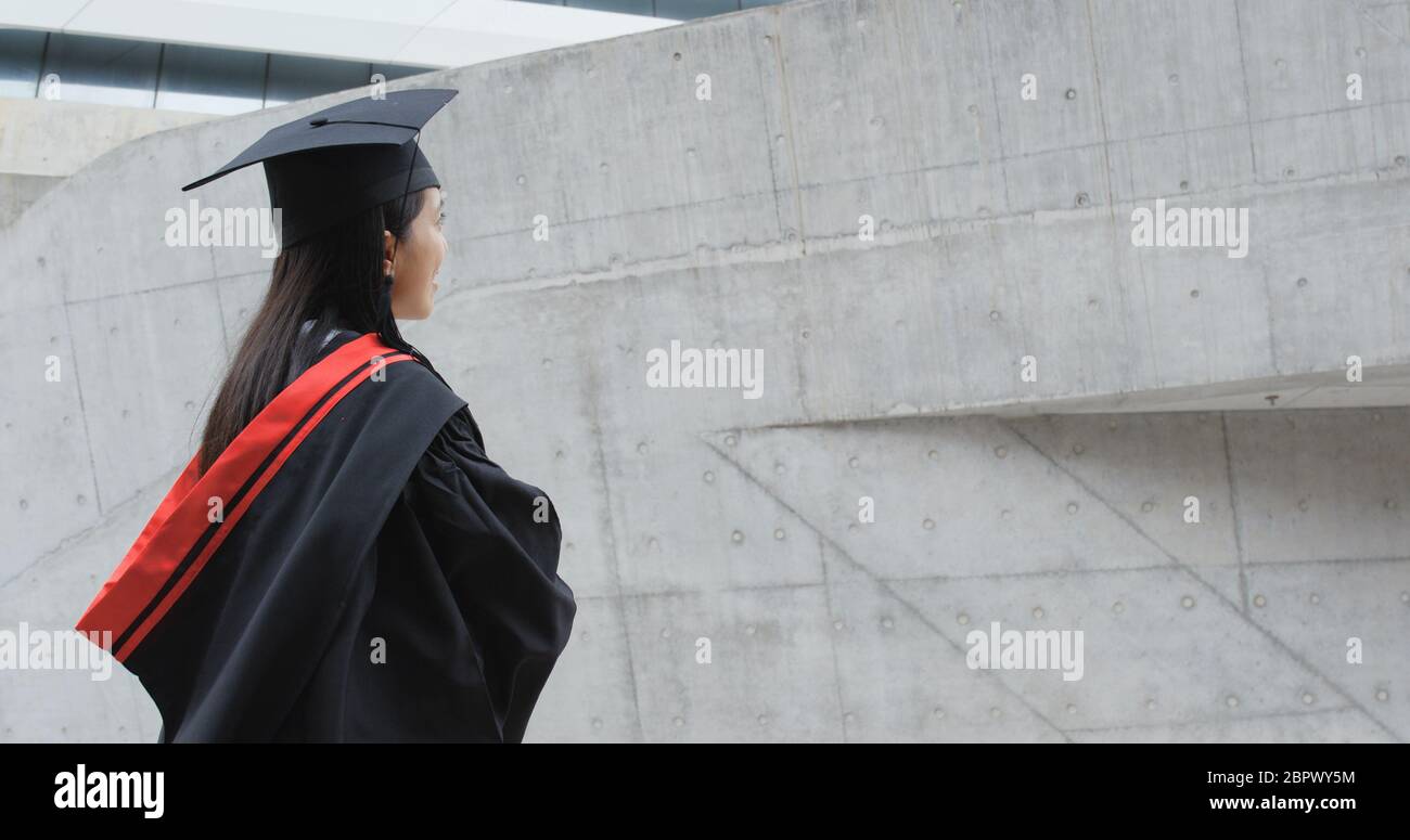 Back rear of woman get graduation Stock Photo - Alamy