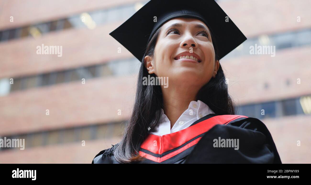 Young woman get graduation Stock Photo - Alamy