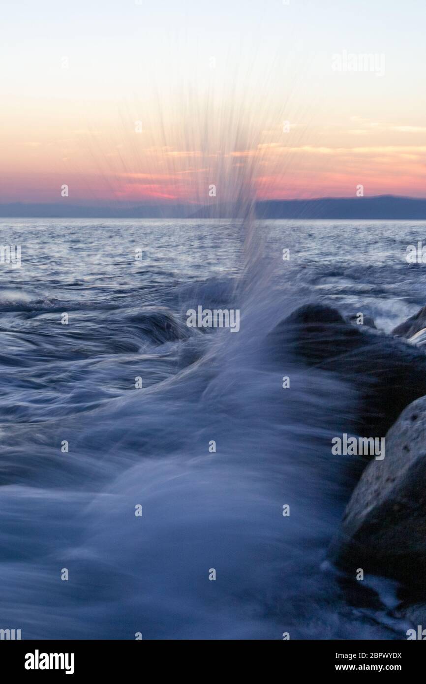 Sea water splash near the coast of the Holy Mount Athos Stock Photo - Alamy