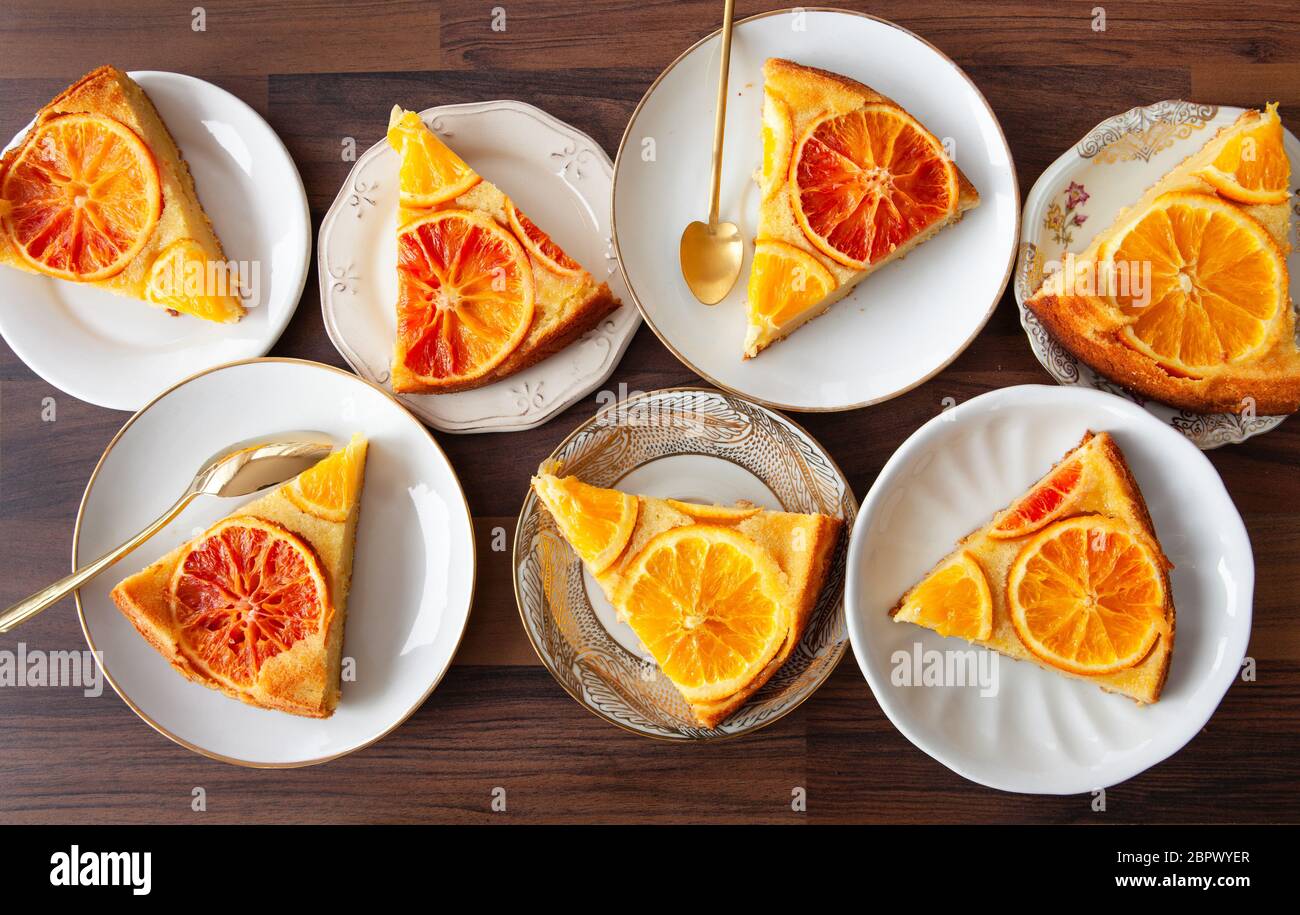 Fruity sponge cake with fresh candied oranges Stock Photo - Alamy