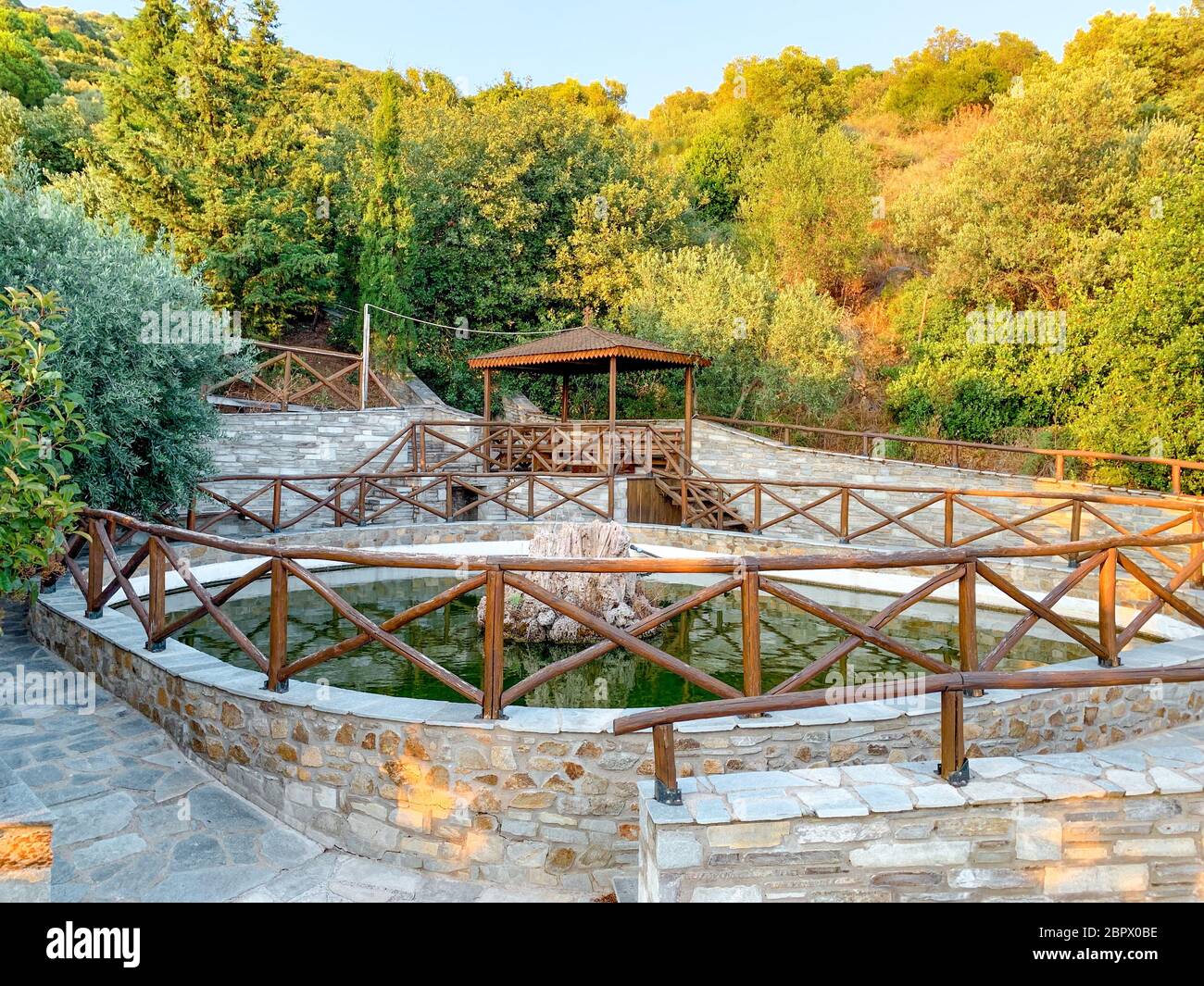 Arbor between trees in the forest near the pool on Mount Athos Stock ...