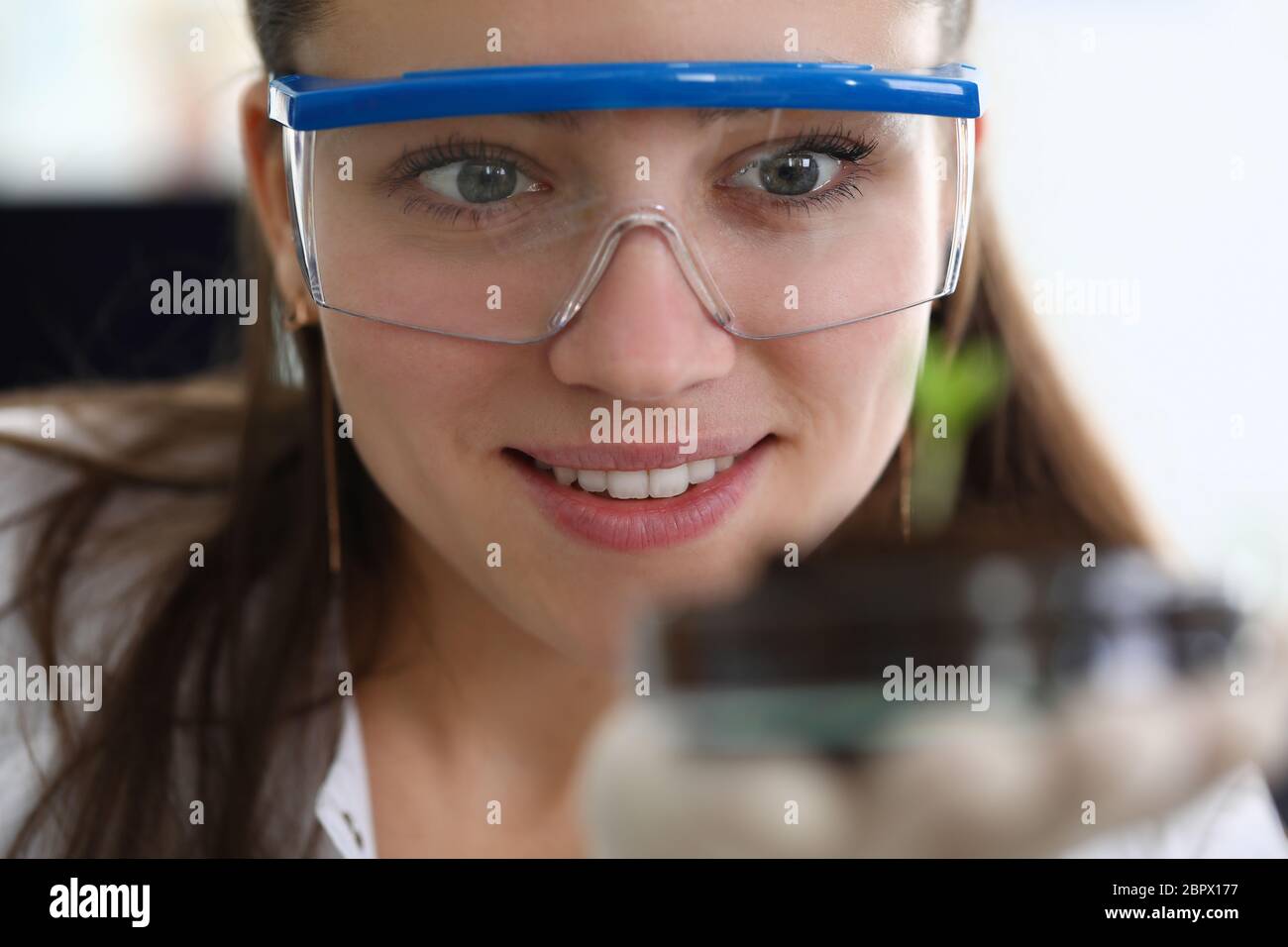 Professional lab worker in uniform Stock Photo - Alamy