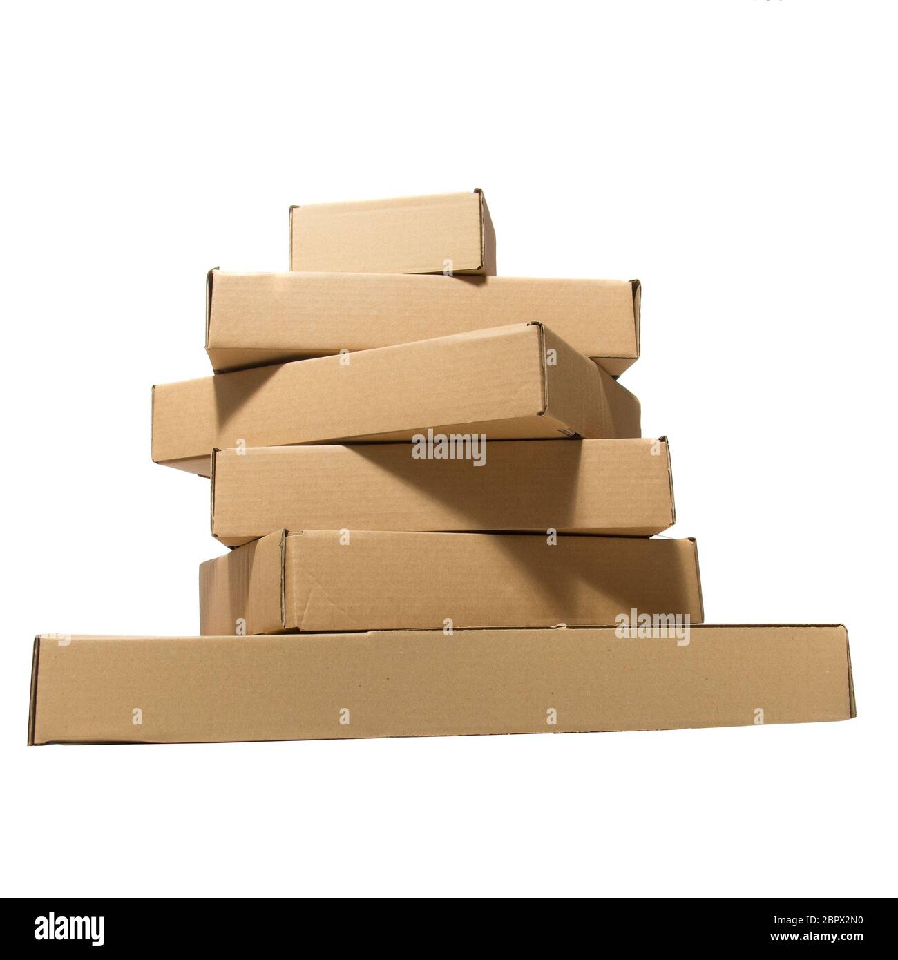 Stack of cardboard boxes isolated on white background Stock Photo - Alamy