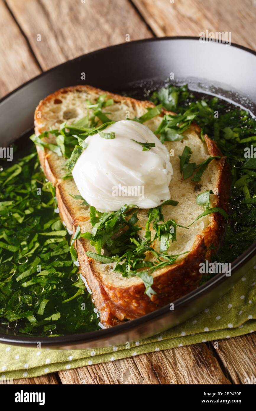 Portuguese Garlic and Cilantro Bread Soup Acorda served with poached ...