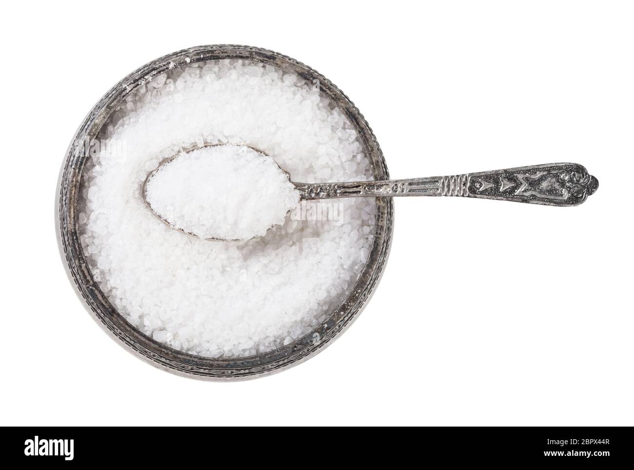 top view of vintage silver salt cellar with spoon with grained Rock ...