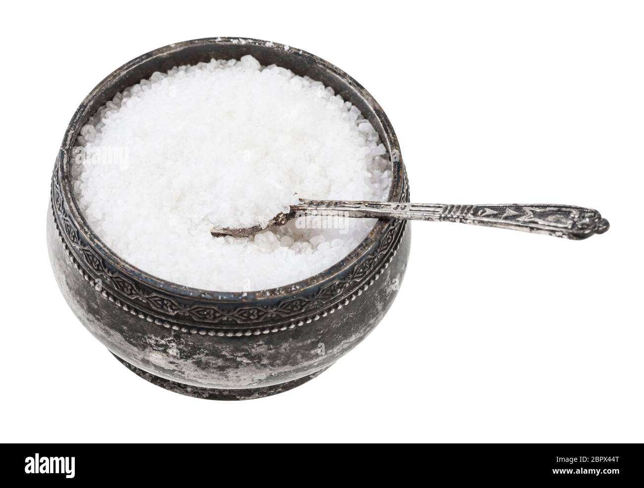 old silver salt cellar with spoon with grained Rock Salt isolated on ...