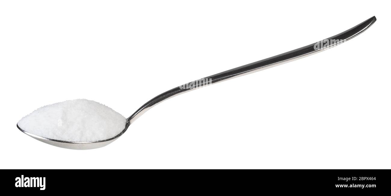 side view of tablespoon with fine ground Sea Salt isolated on white ...