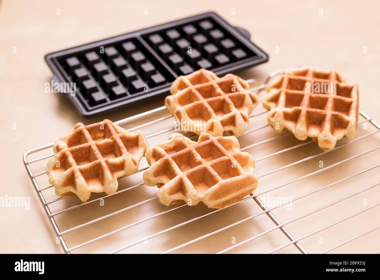 Baking waffle at home Stock Photo - Alamy