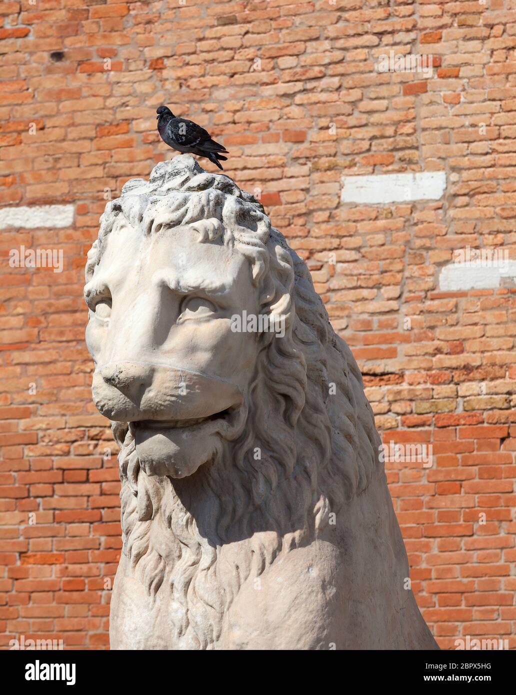 Venetian Arsenal, old shipyard, stone lion, Venice, Italy. Construction ...