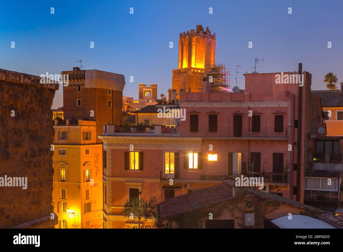 Aerial view of Old Town rooftops at night in Rome, Italy Stock Photo ...