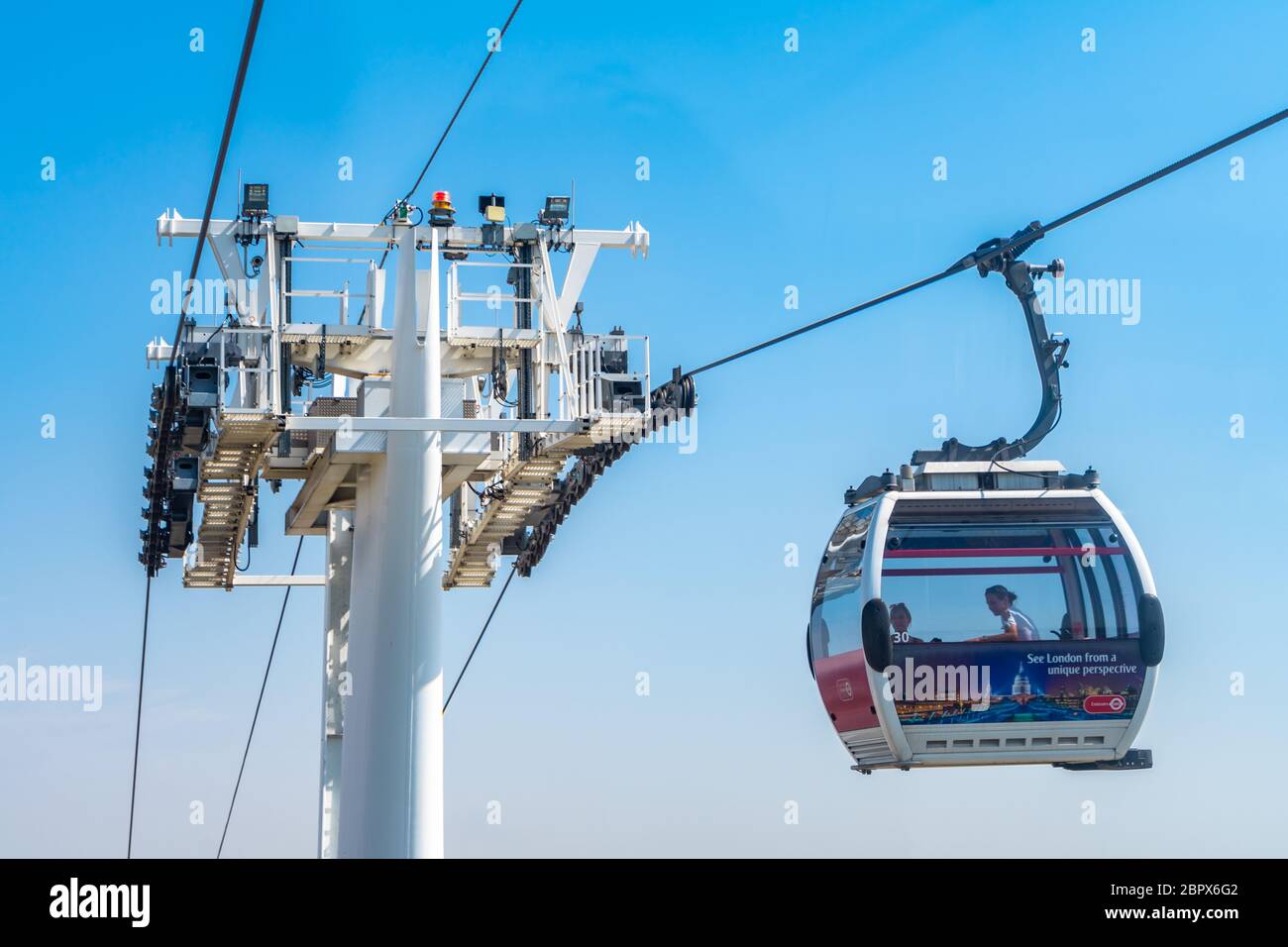 Emirates Air Line cable cars on thames river in London, UK Stock Photo ...