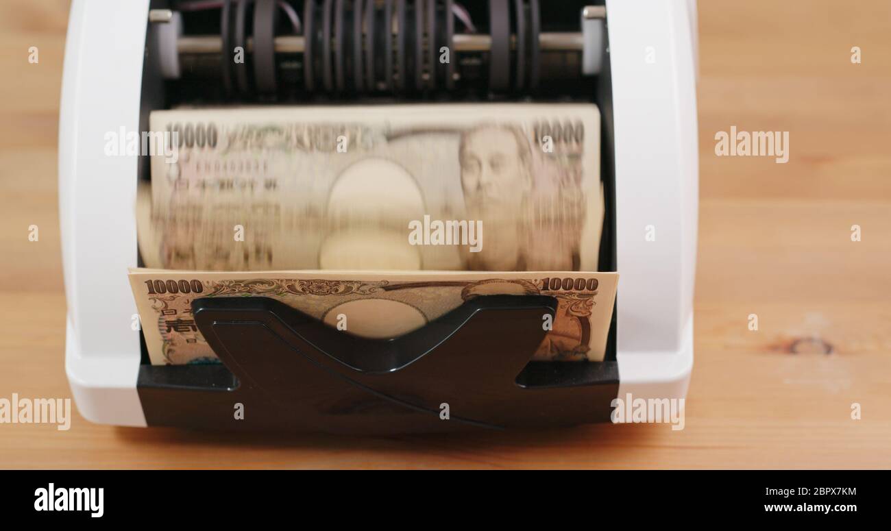 Money counting machine bank close hi-res stock photography and images ...
