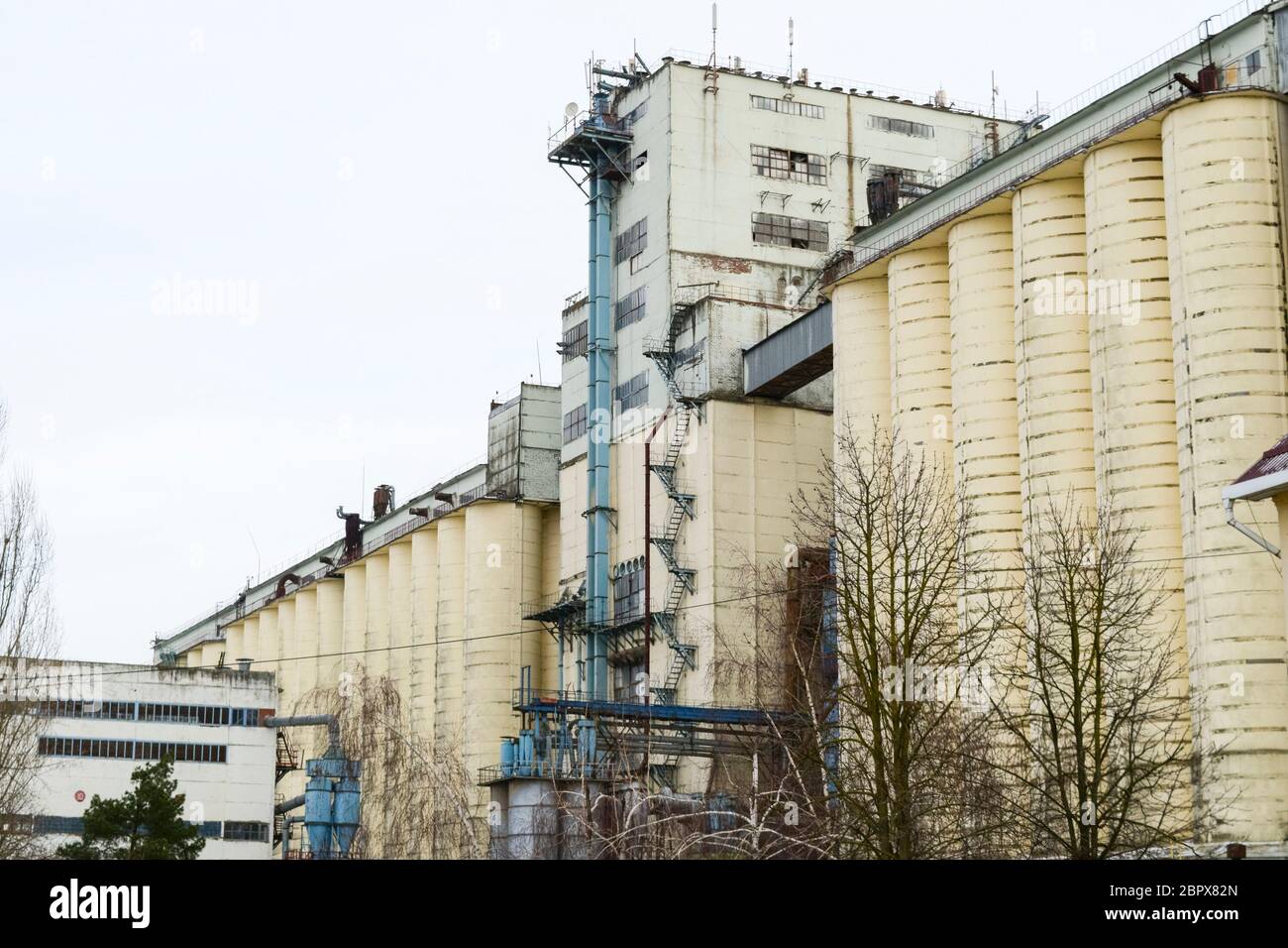 Building for storing and drying grain. Soviet-built elevator Stock ...