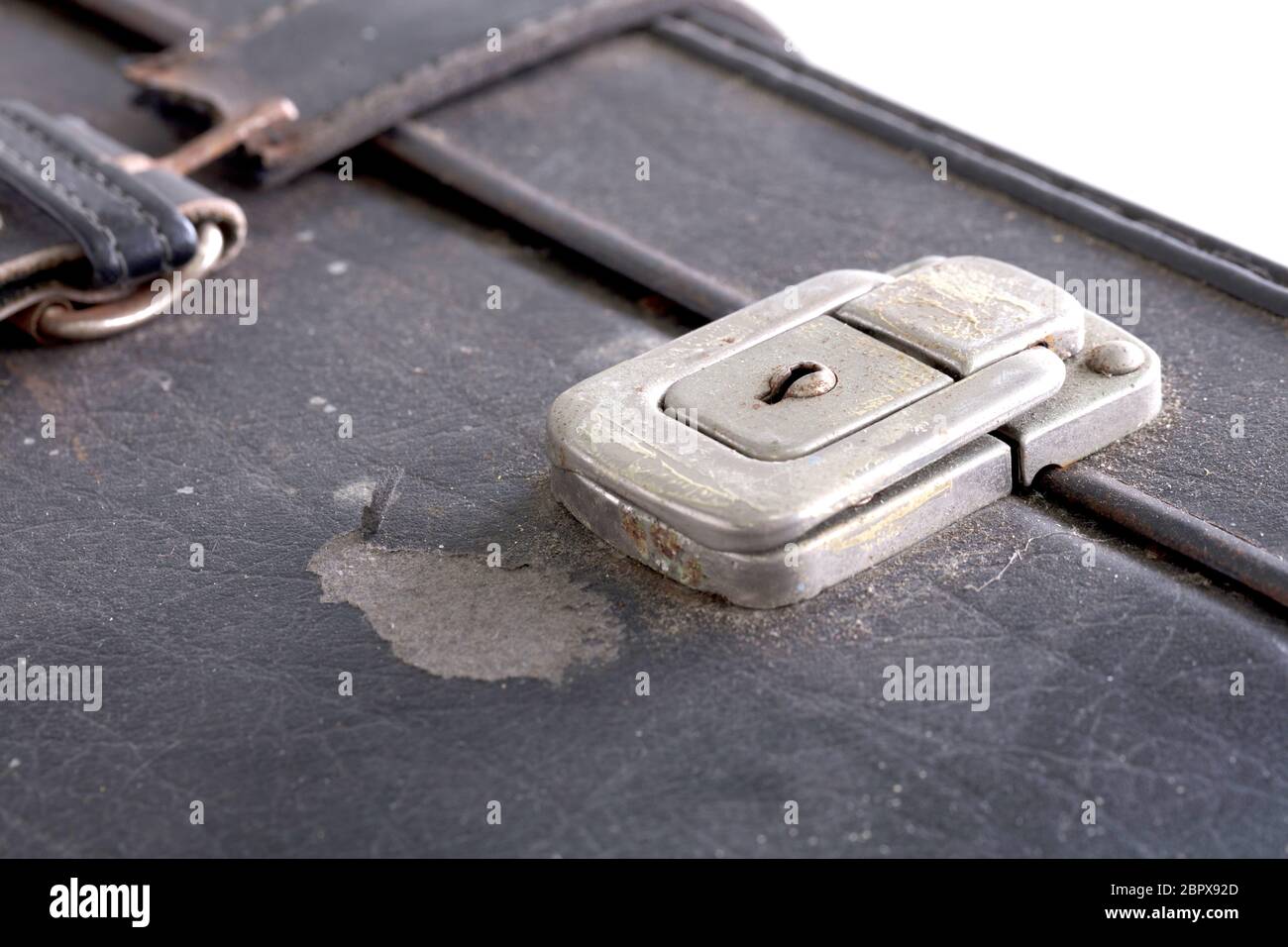Old vintage hard suitcase with metal latch lock Stock Photo - Alamy