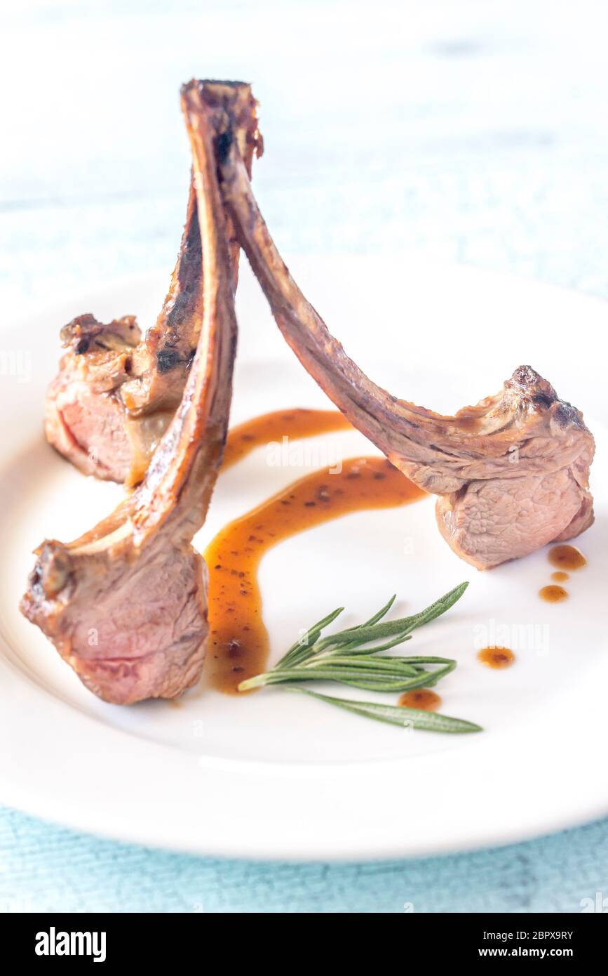Grilled lamb rib chops on the plate Stock Photo - Alamy