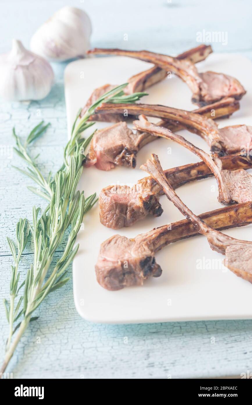 Grilled lamb rib chops on the plate Stock Photo - Alamy