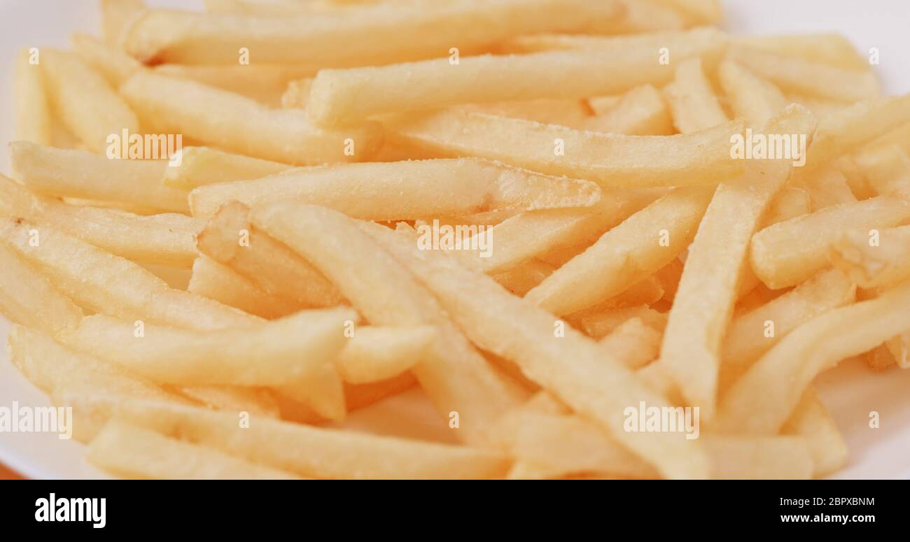 Stack of french fries Stock Photo - Alamy