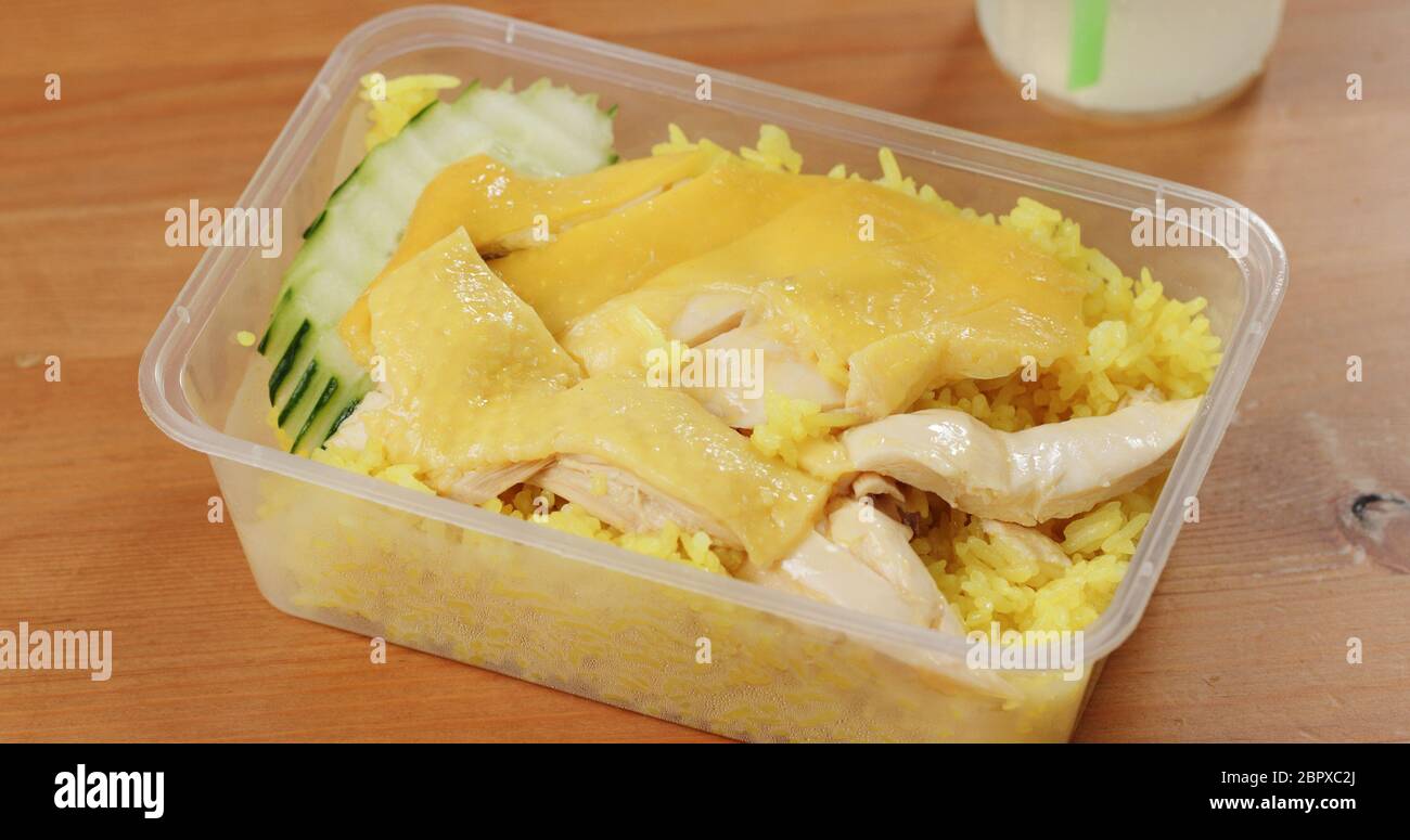 Hainanese chicken rice in take away box Stock Photo - Alamy