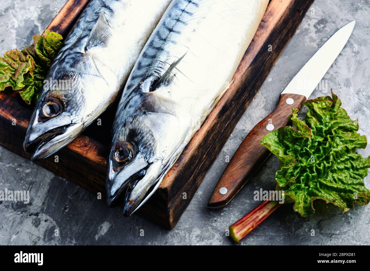 Salted mackerel on a kitchen board.Smoked mackerel Stock Photo - Alamy