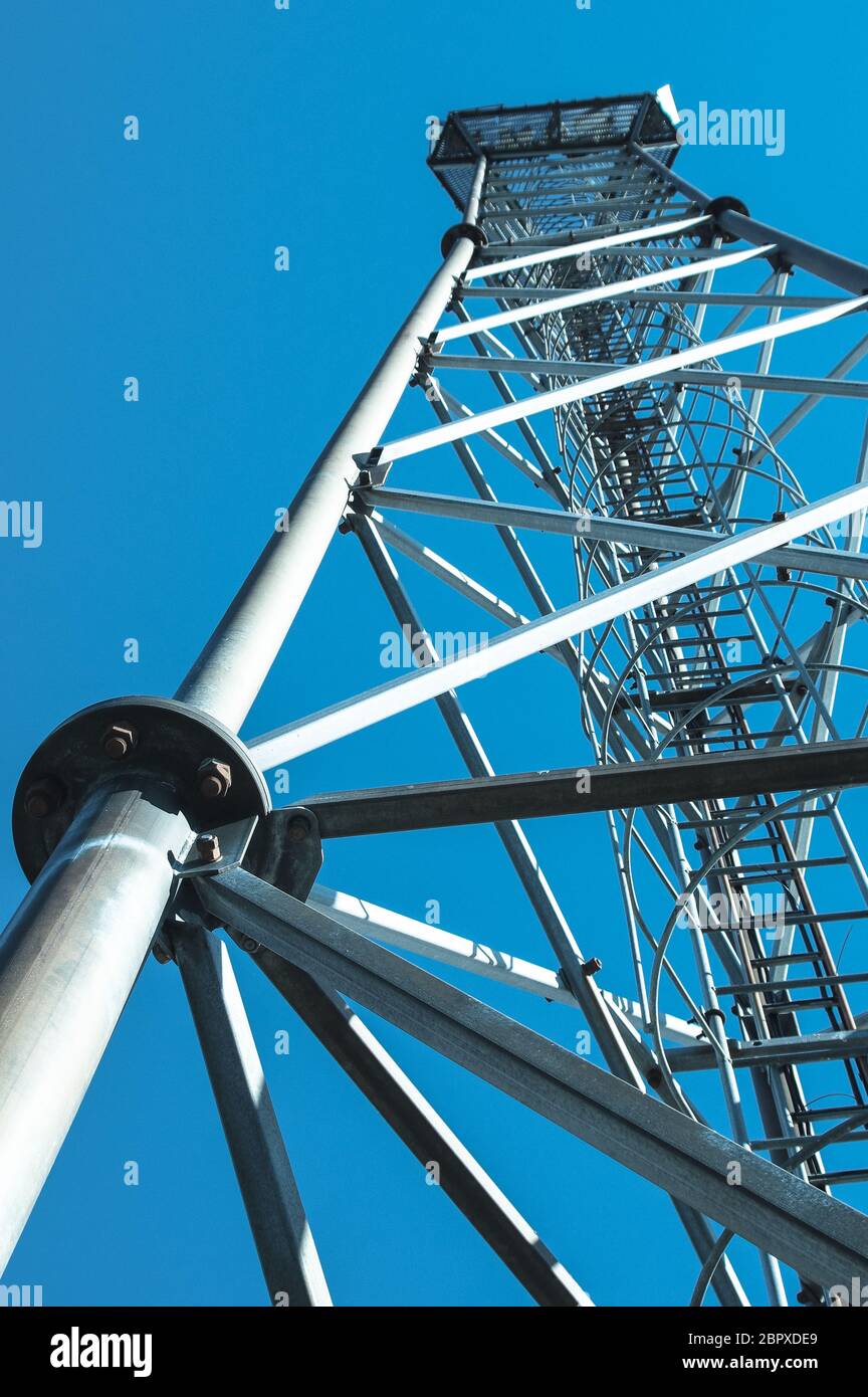 Industrial concrete and metal tower Stock Photo - Alamy