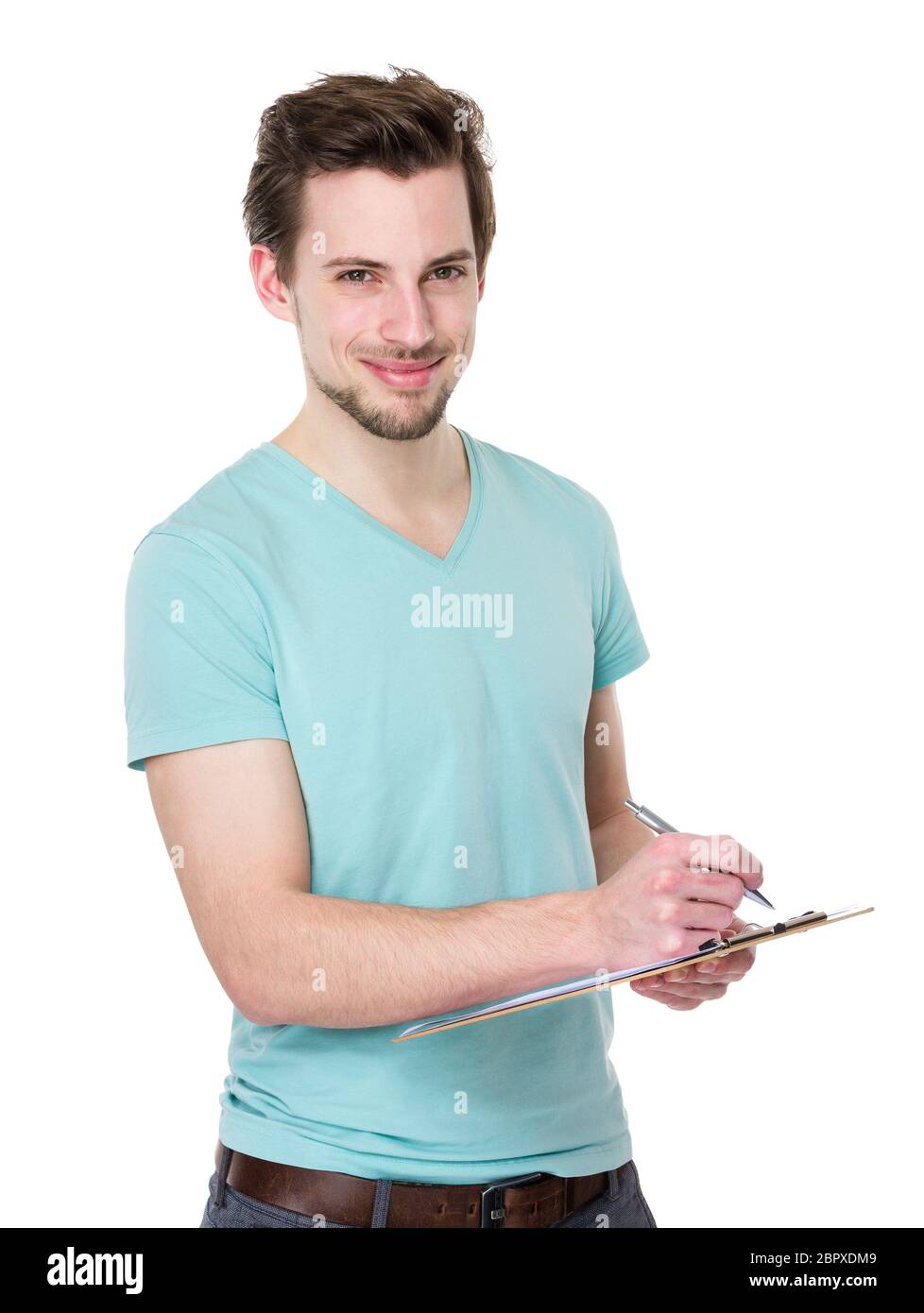 Caucasian man write on clipboard Stock Photo - Alamy