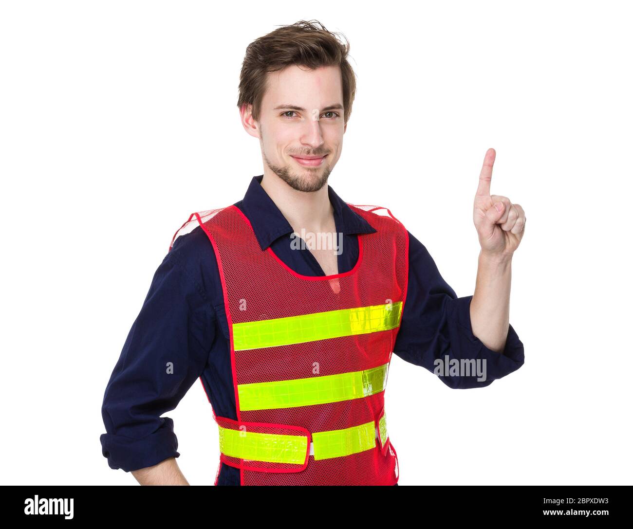 Workman pointing up Stock Photo - Alamy