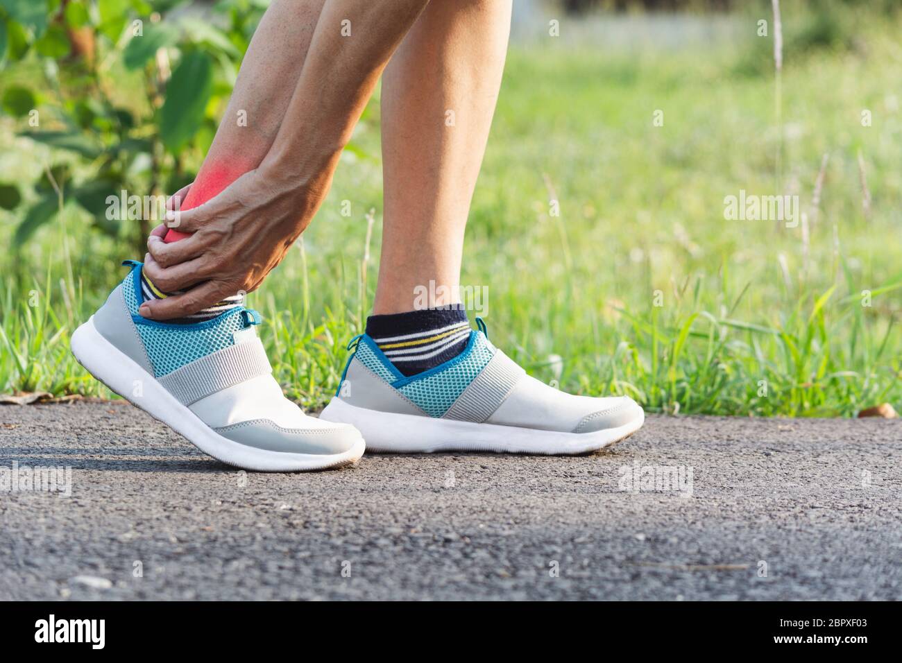 The female clings to a bad leg. The pain in her leg. Health and painful ...