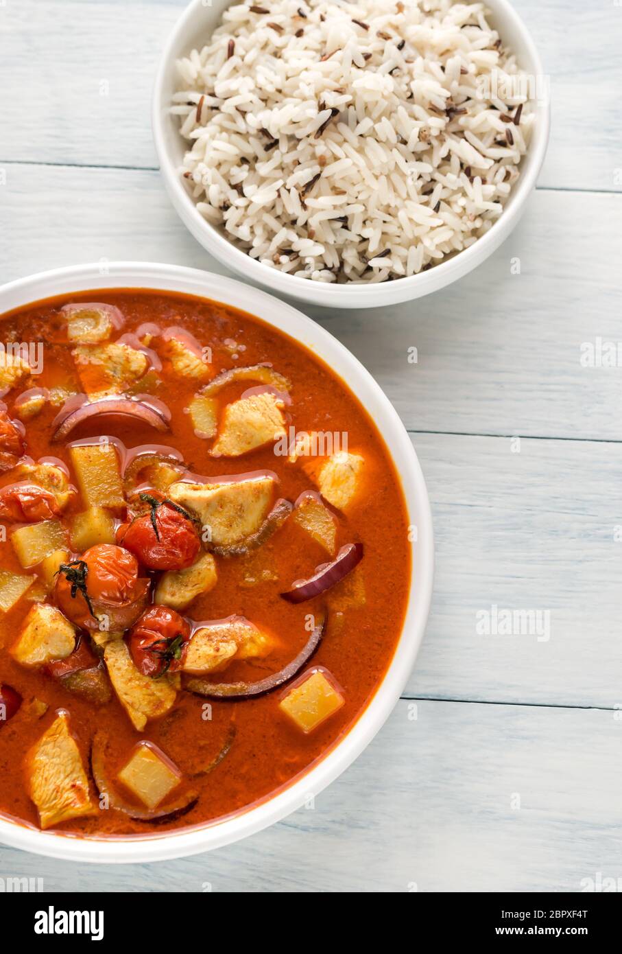 Thai yellow curry with chicken and rice Stock Photo - Alamy