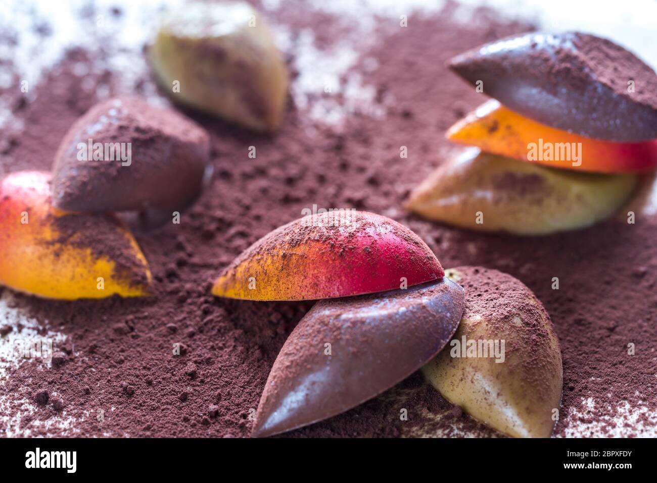 Luxury chocolate candies with cocoa powder Stock Photo - Alamy