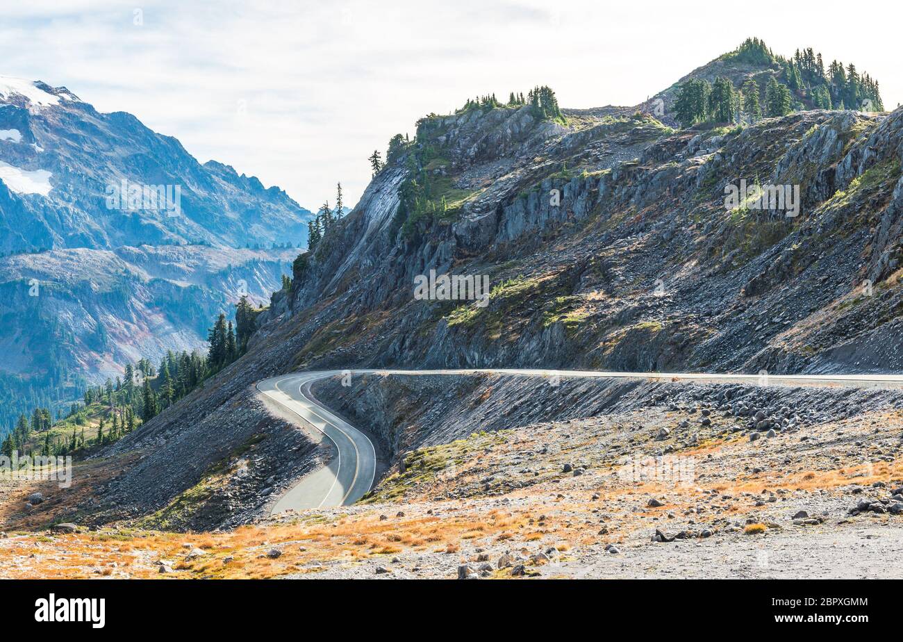 scenic view of curve and slope asphalt road on the mountain on the day ...