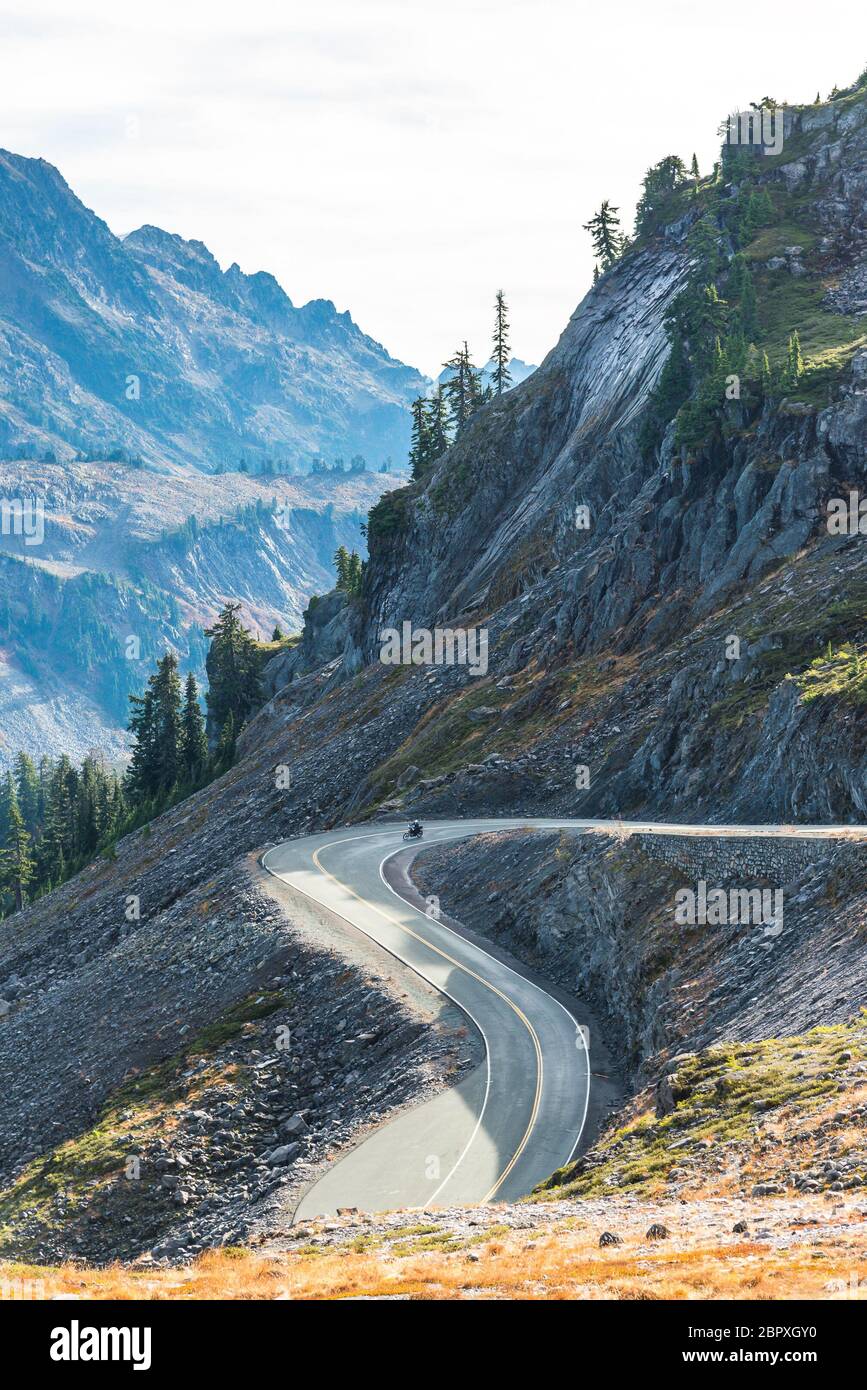 scenic view of curve and slope asphalt road on the mountain on the day ...