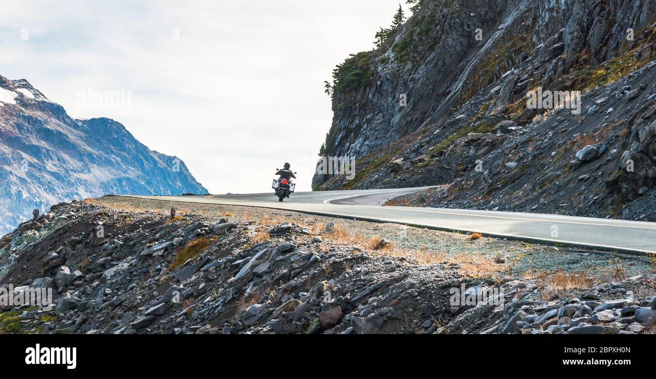 scenic view of curve and slope asphalt road on the mountain on the day ...