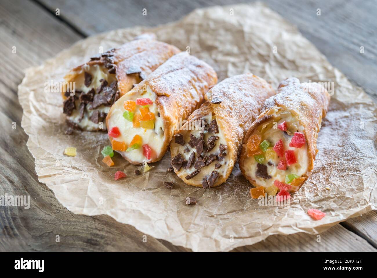 Cannoli stuffed with cream cheese Stock Photo - Alamy