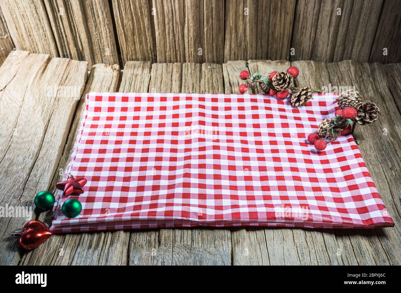 empty wooden table top with red chess napery Ready for product display ...