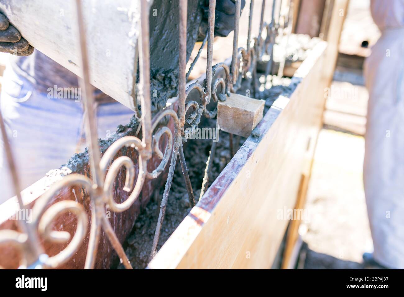 Work with cement mortar, pouring cement mortar wall, foundation and ...