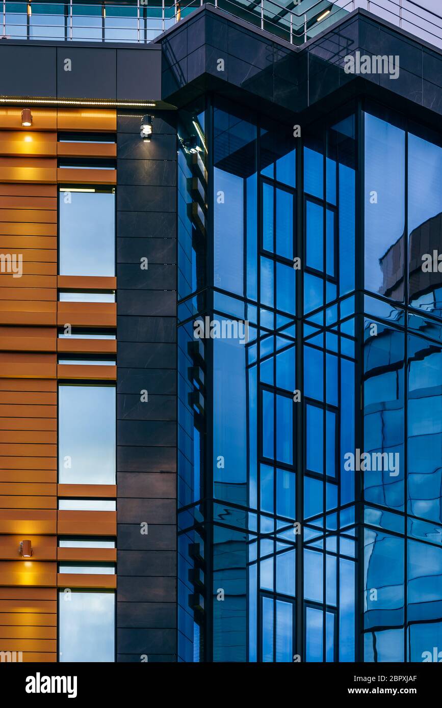 Modern high-rise office building with a glass facade, background Stock ...