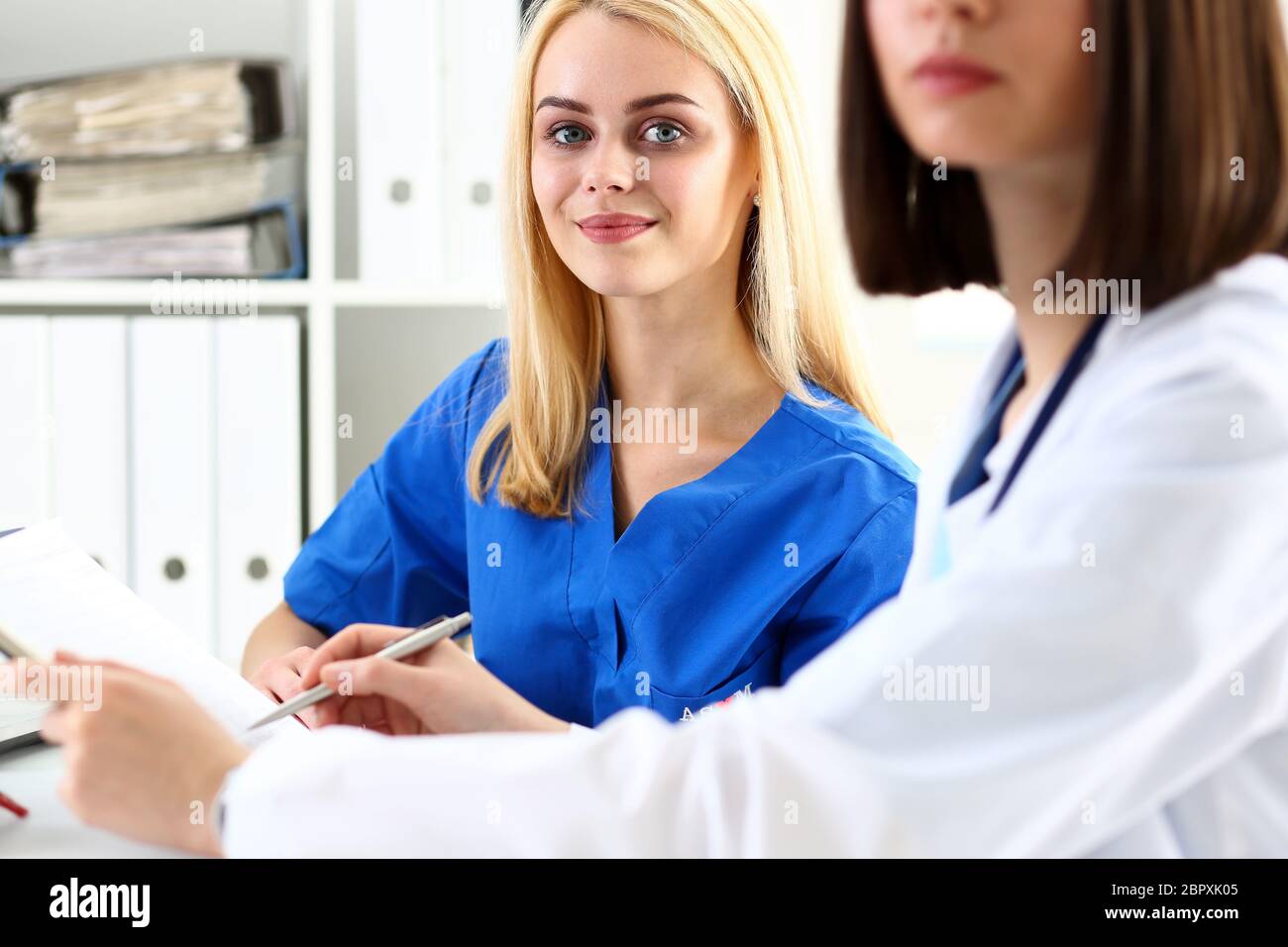 Talking during conference hi-res stock photography and images - Alamy