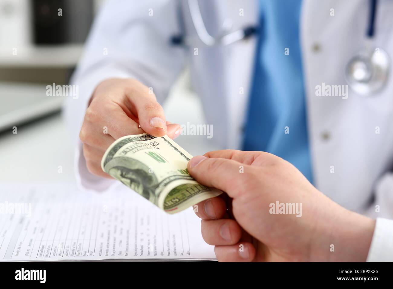 Doctor cash dollars hi-res stock photography and images - Alamy