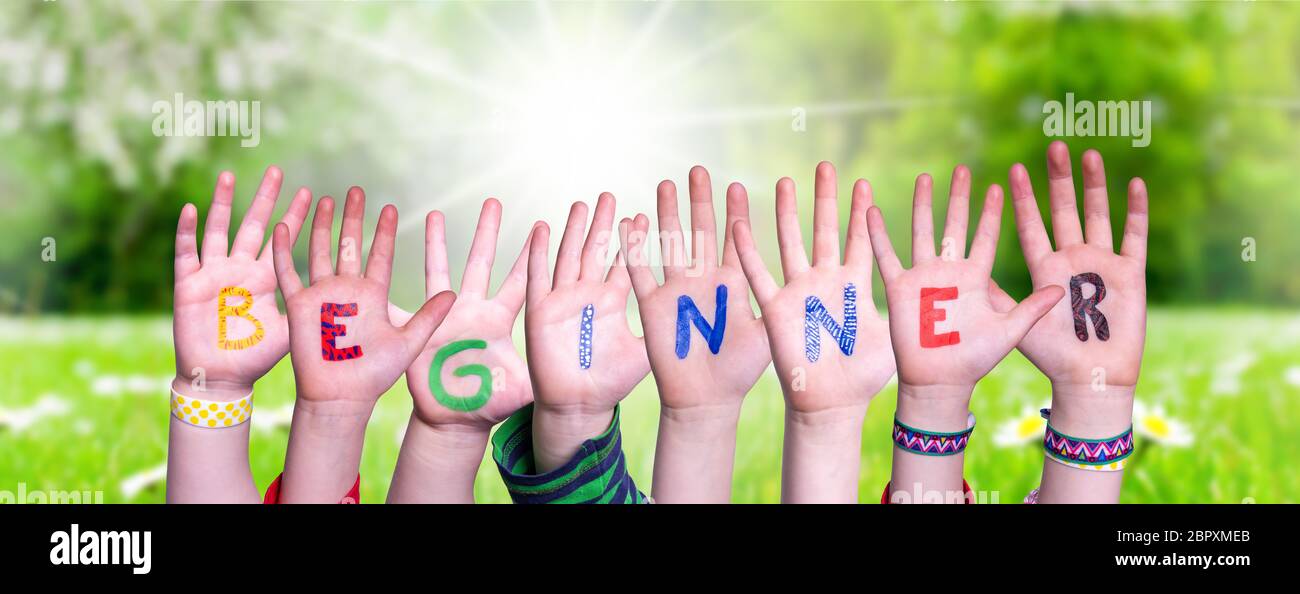 Children Hands Building Word Beginner, Grass Meadow Stock Photo - Alamy
