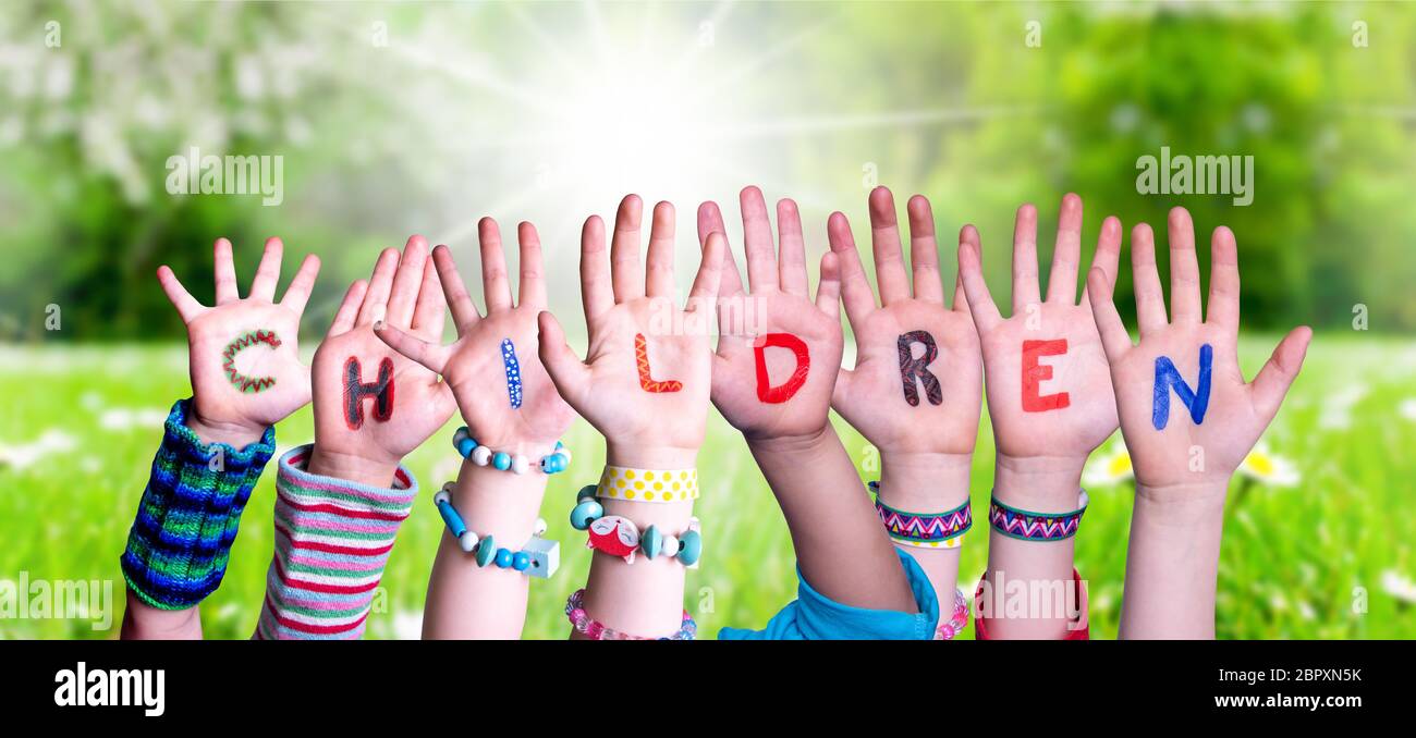 Children Hands Building Word Children, Grass Meadow Stock Photo - Alamy