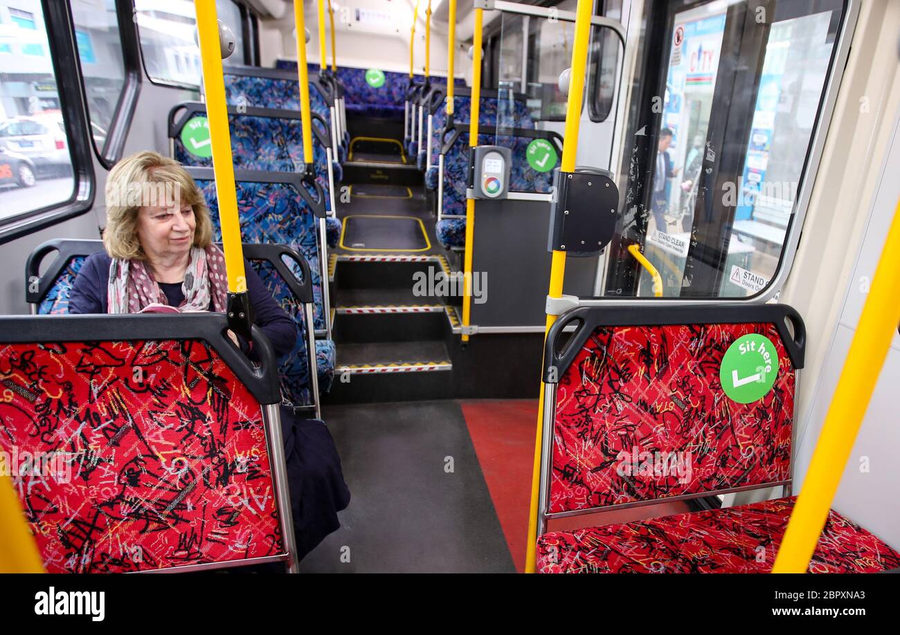 Offering seat on bus hi-res stock photography and images - Alamy