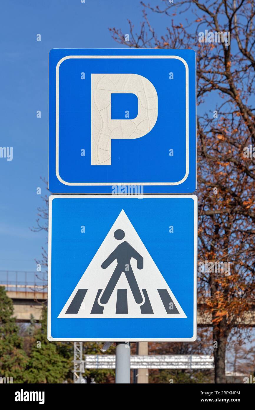 Parking and Pedestrian Crossing Traffic Sign Stock Photo - Alamy