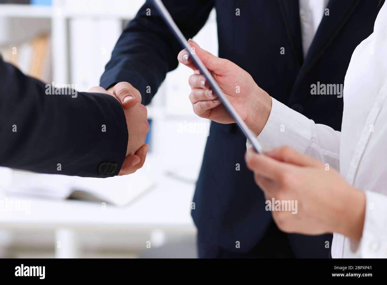 Arab businessman and his translator welcome business partner and says ...