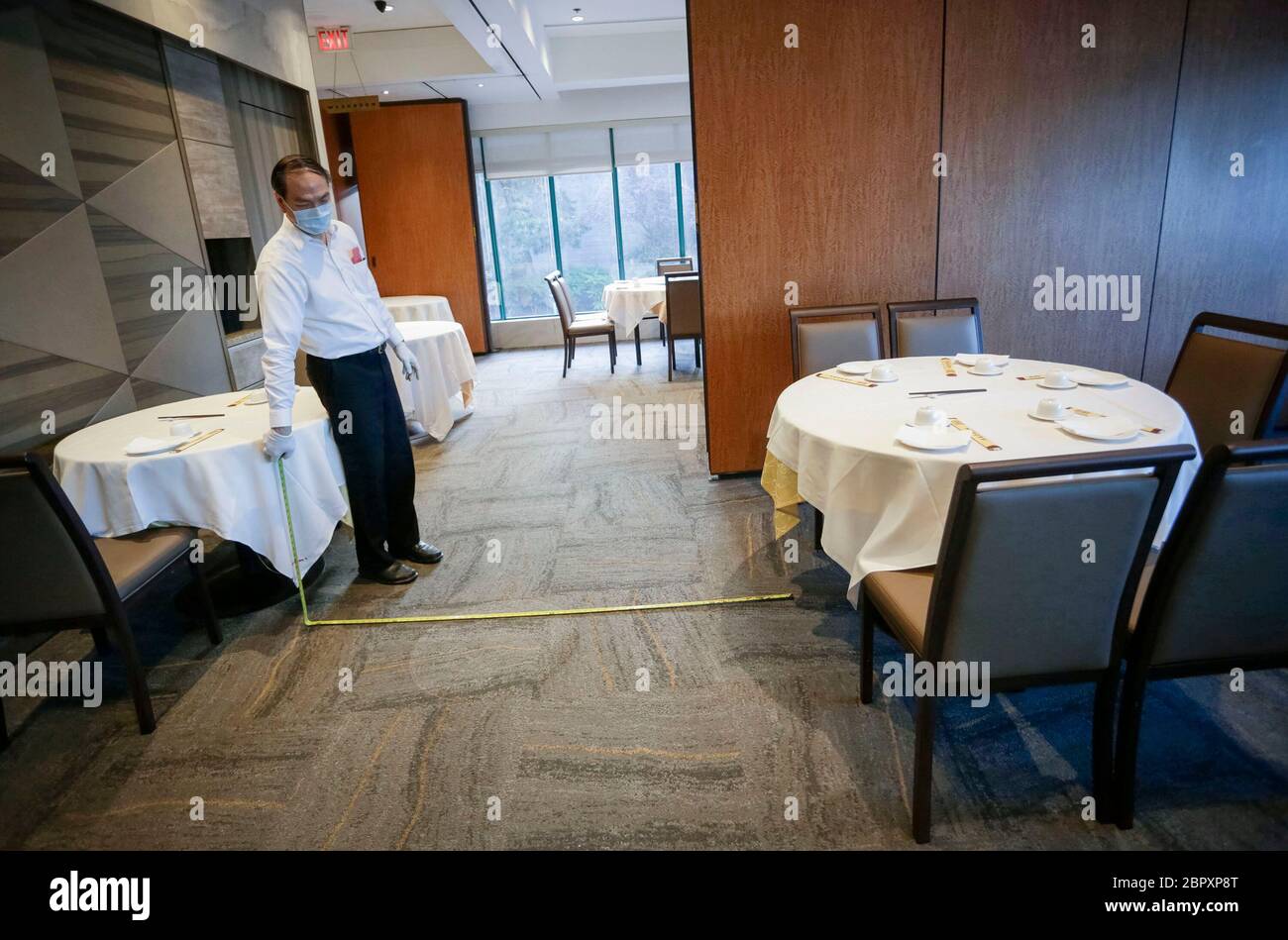 Between tables hi-res stock photography and images - Alamy