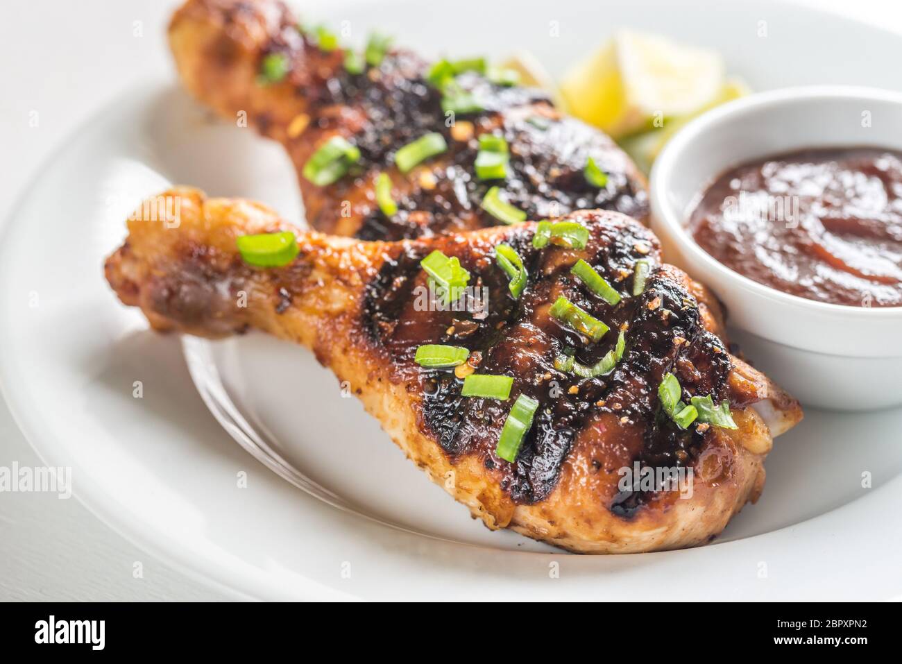 Grilled chicken drumsticks Stock Photo - Alamy