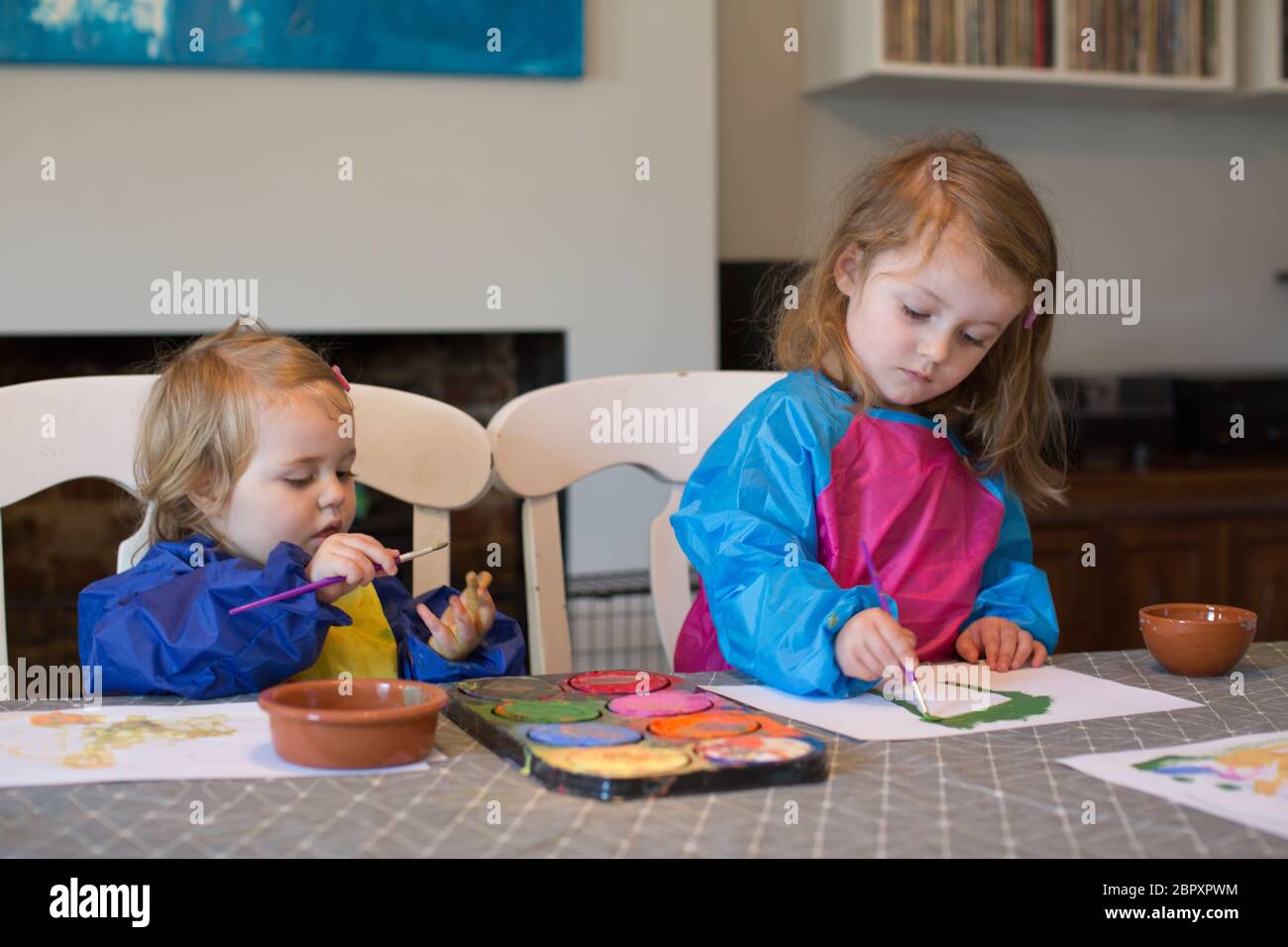 Children colouring and painting Stock Photo - Alamy