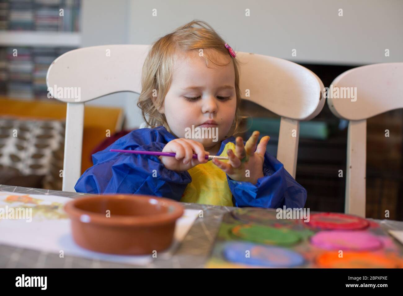 Children colouring and painting Stock Photo - Alamy