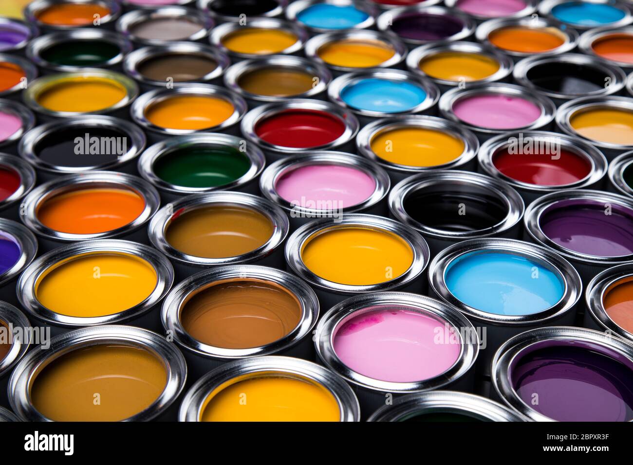 Collection of colored paints cans Stock Photo - Alamy